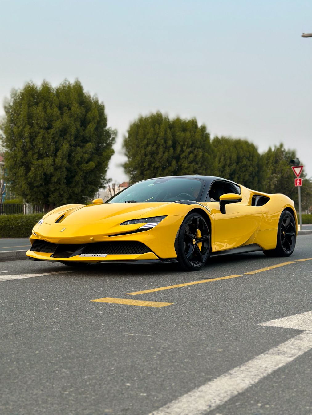 Rent Ferrari SF90 Stradale (yellow) 2024 in Dubai | Rentop